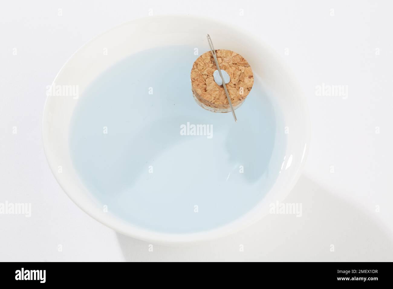 Floating needle compass hi-res stock photography and images - Alamy