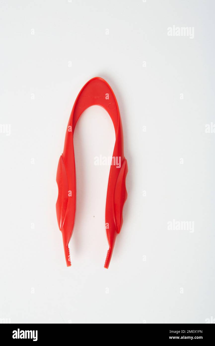 Small red tweezers Stock Photo - Alamy