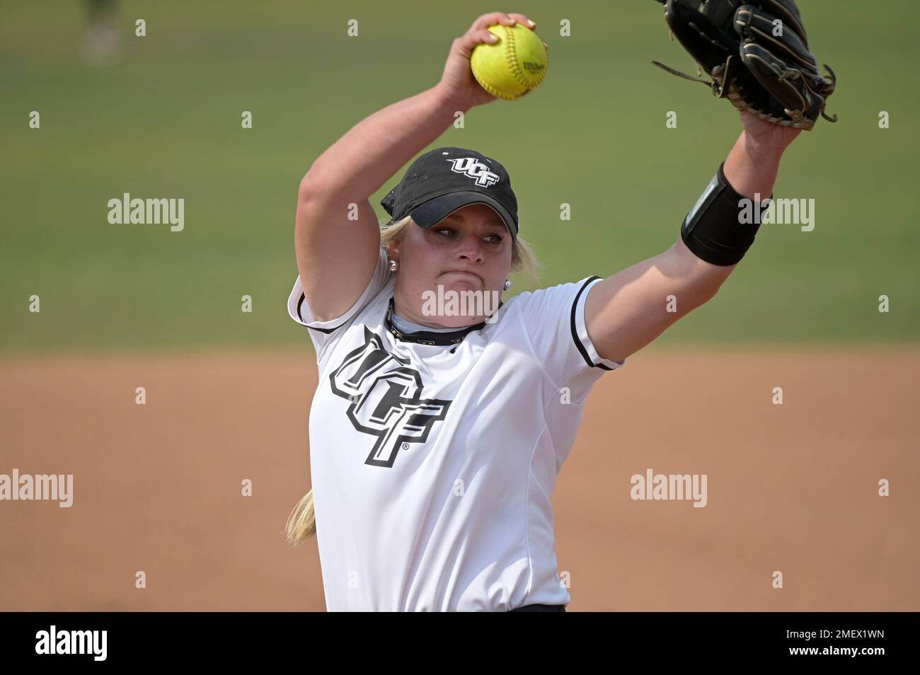 Central Florida pitcher Alea White throws to home plate during an NCAA ...
