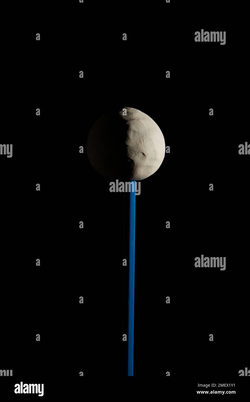 Plasticine model of the Earth's Moon on the end of a pencil Stock Photo ...