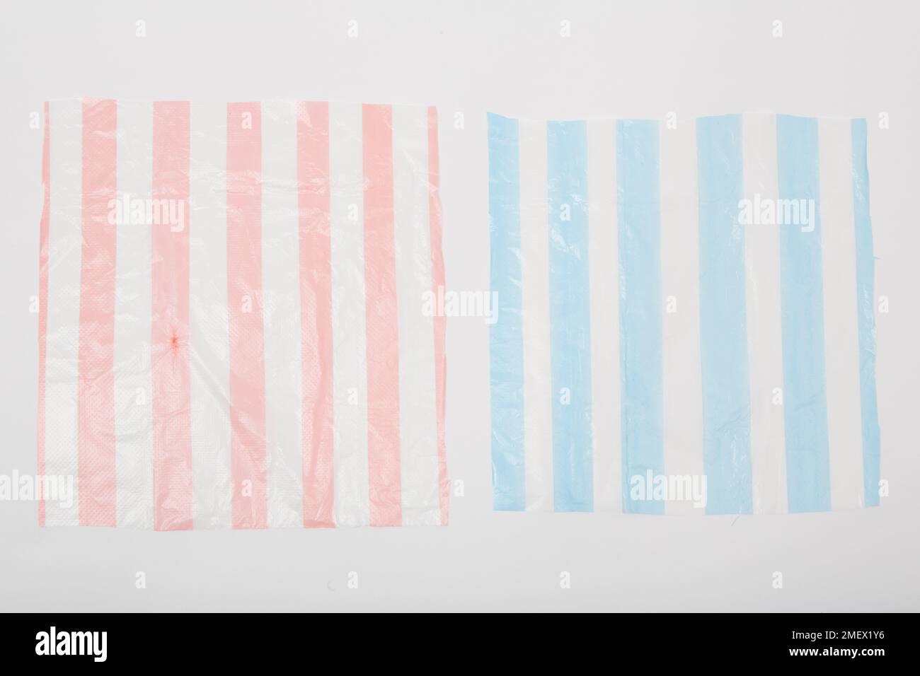 Blue and red plastic bags Stock Photo - Alamy