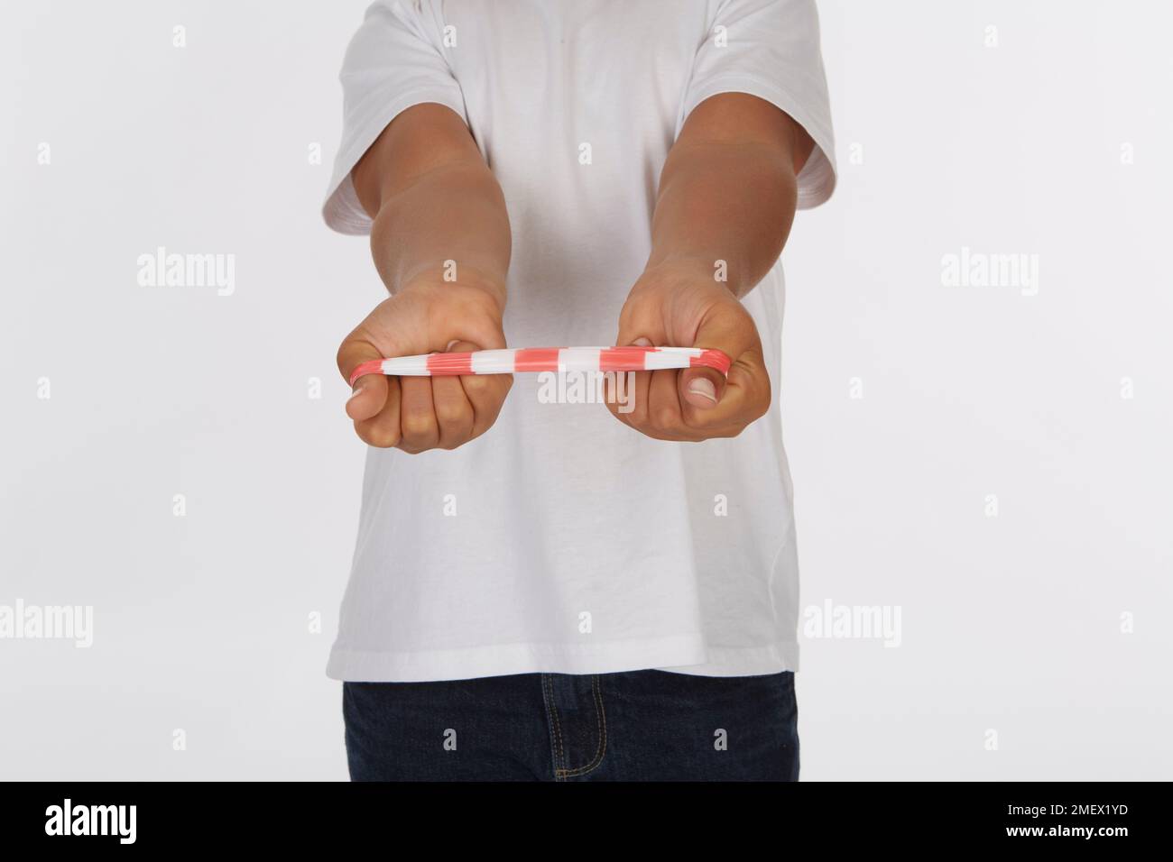 A red plastic bag is used as part of a strength test Stock Photo - Alamy