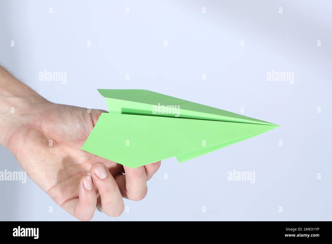 Paper plane made from coloured paper Stock Photo - Alamy