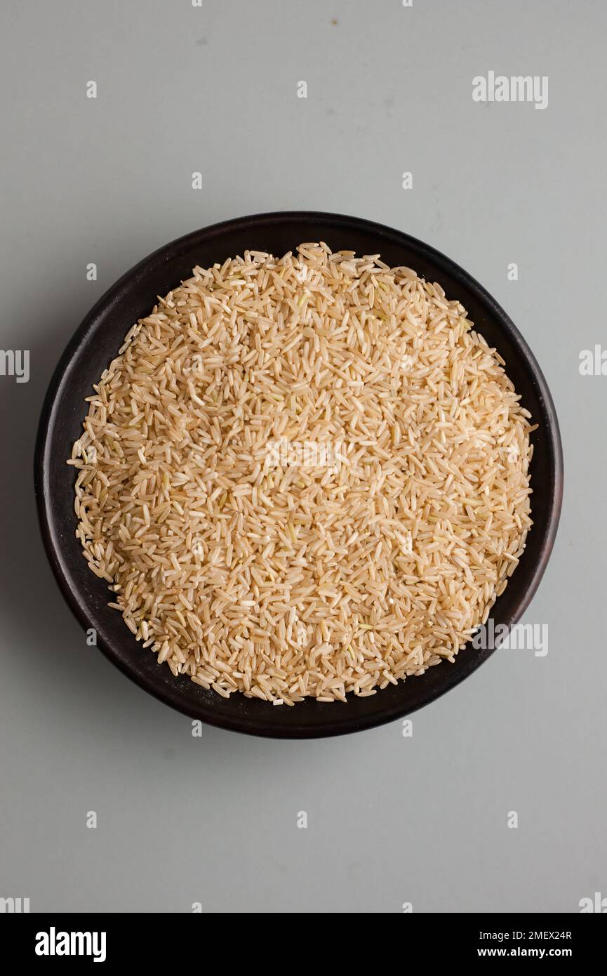 Vertical shot brown long rice hi-res stock photography and images - Alamy