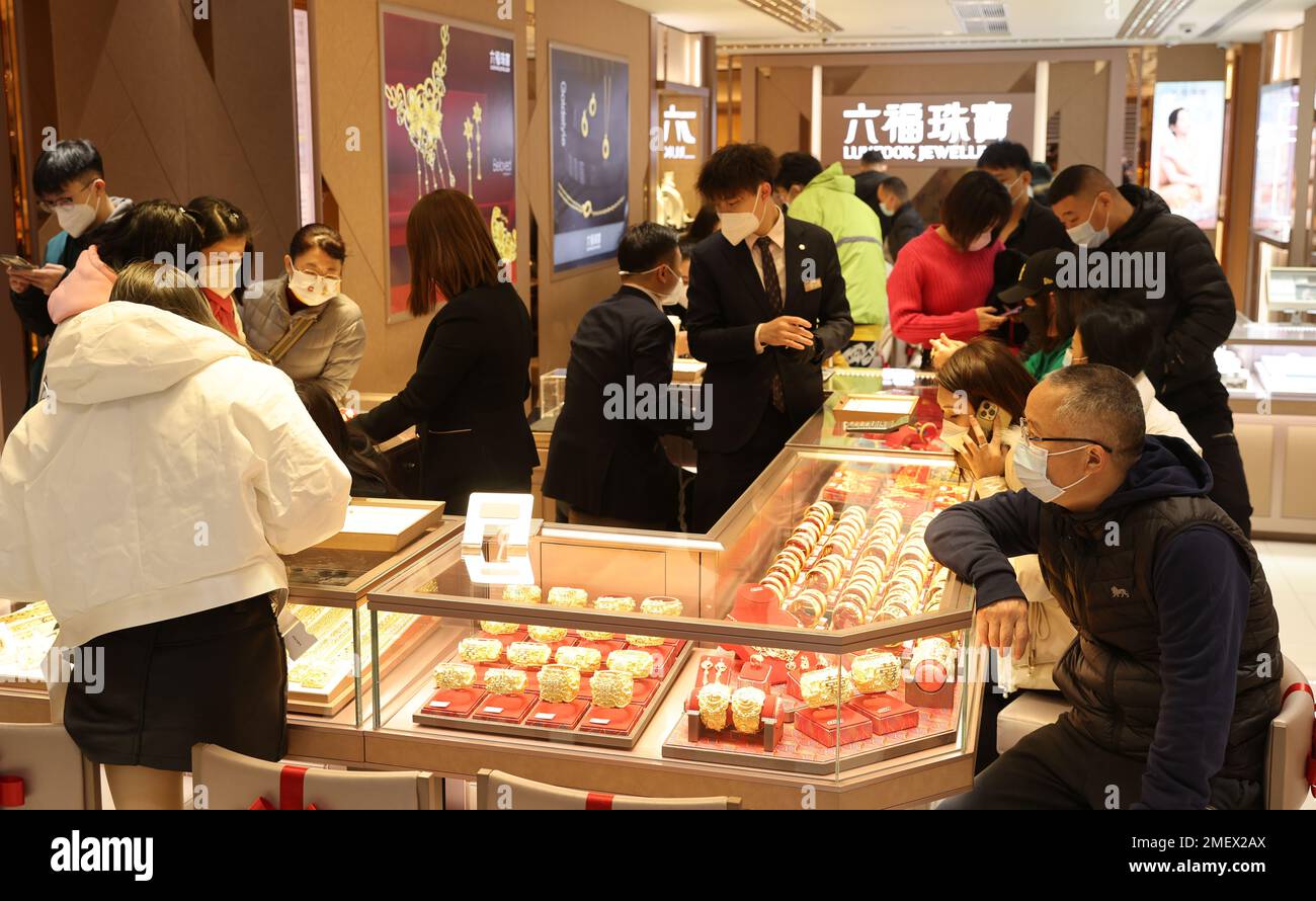 Mainland China tourists buying gold jewelry at a gold jewelry store in ...
