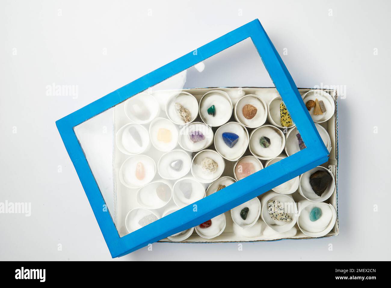 Rock collection in home made box Stock Photo - Alamy