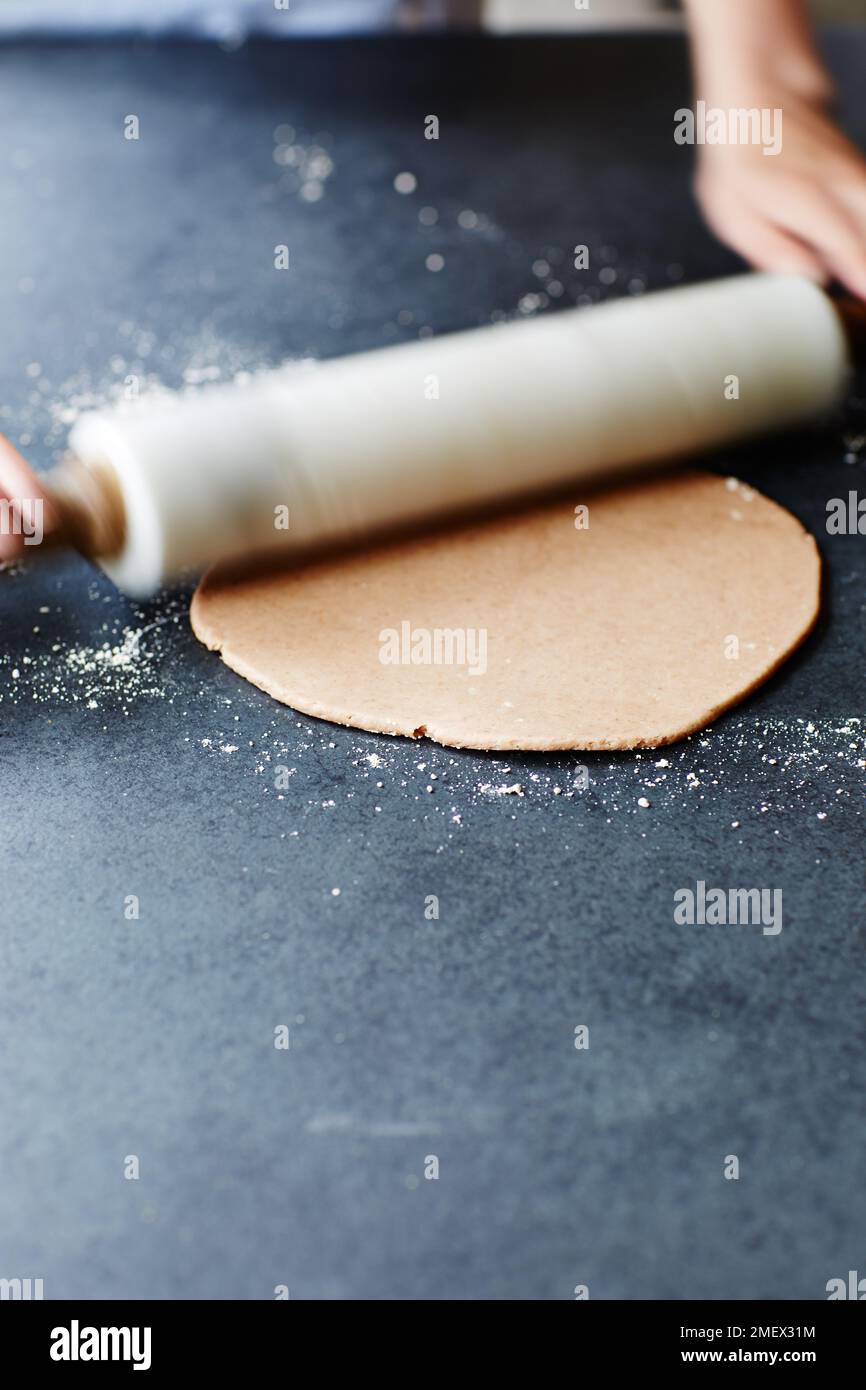 Hand rolling 2 Stock Photo - Alamy