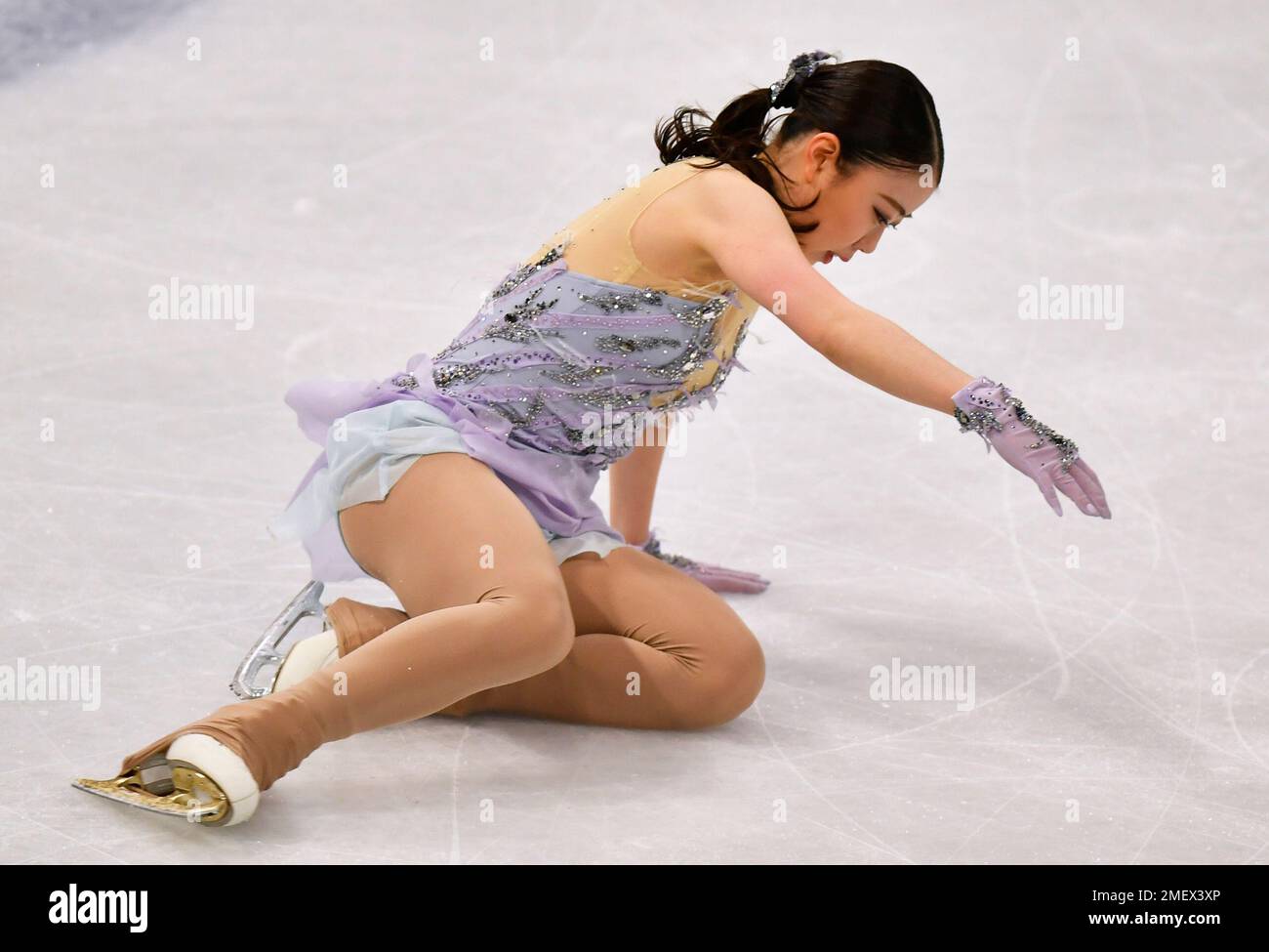 Rika Kihira of Japan falls as she performs during the Ladies Free Skating at the Figure Skating ...