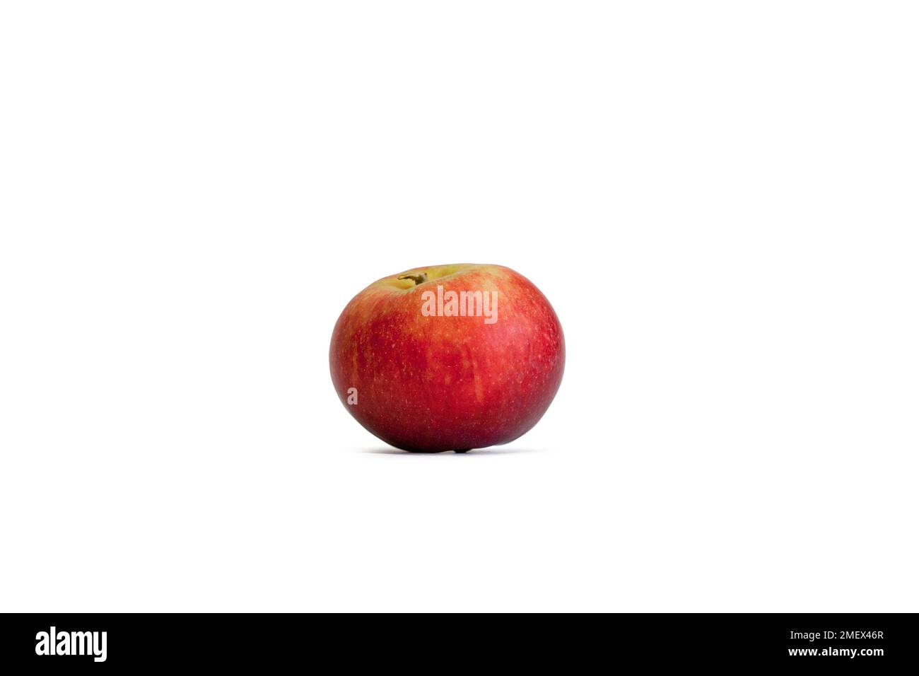 Red devil apple on display Stock Photo - Alamy