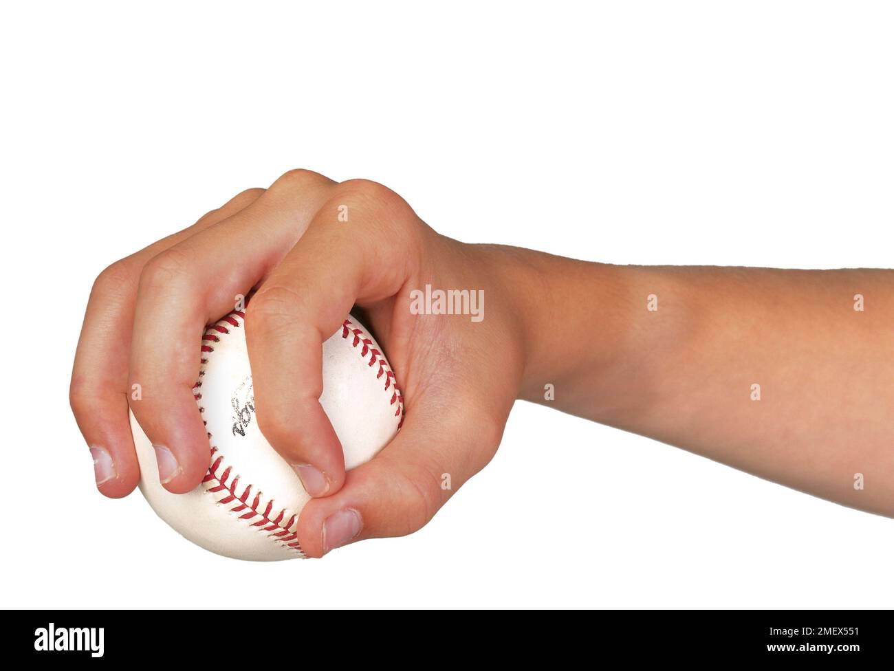 Gripping a baseball ball Stock Photo - Alamy