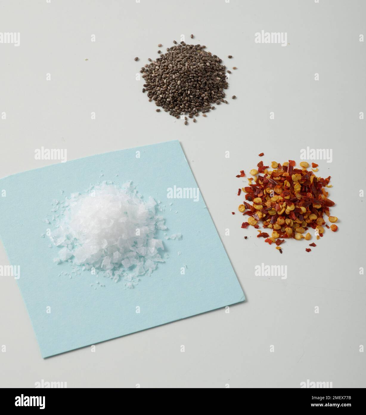 Salt, chia seeds and chilli flakes Stock Photo - Alamy