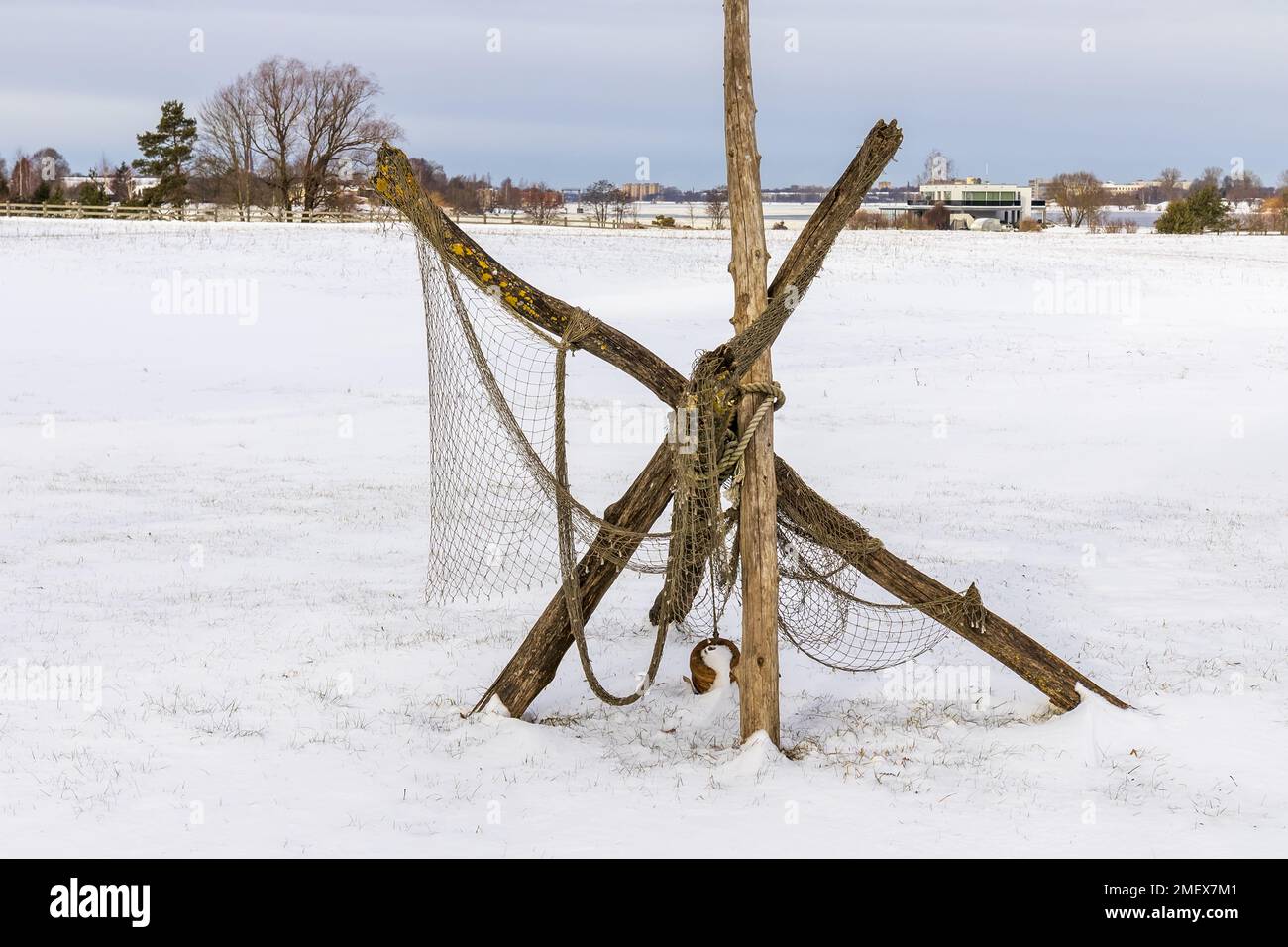 Winter day with wooden cross stand, fishing net and foam buoy Stock ...