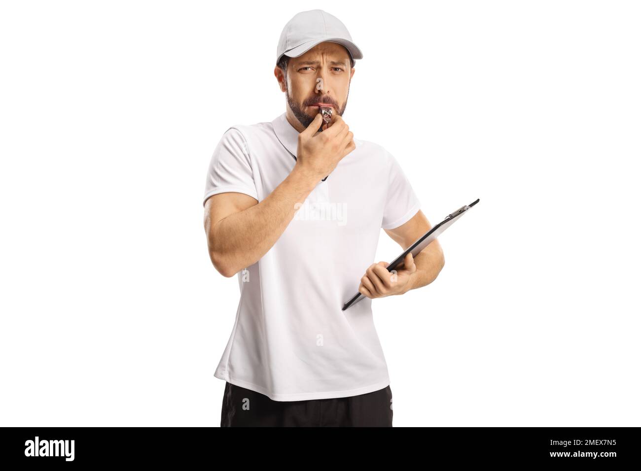 Angry sports coach blowing a whistle isolated on white background Stock ...