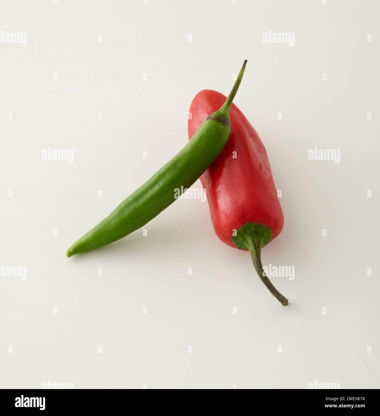 Green and red chillis Stock Photo - Alamy