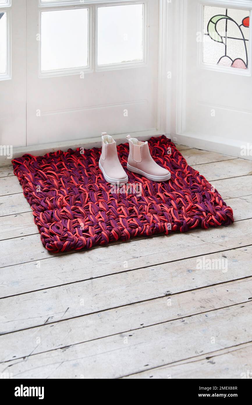Arm Knitted Rug Stock Photo - Alamy