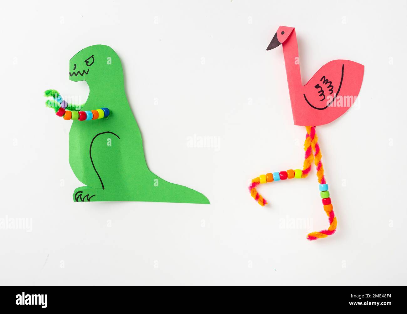 Paper Trex and flamingo with pipe cleaner arms and legs with bead on ...