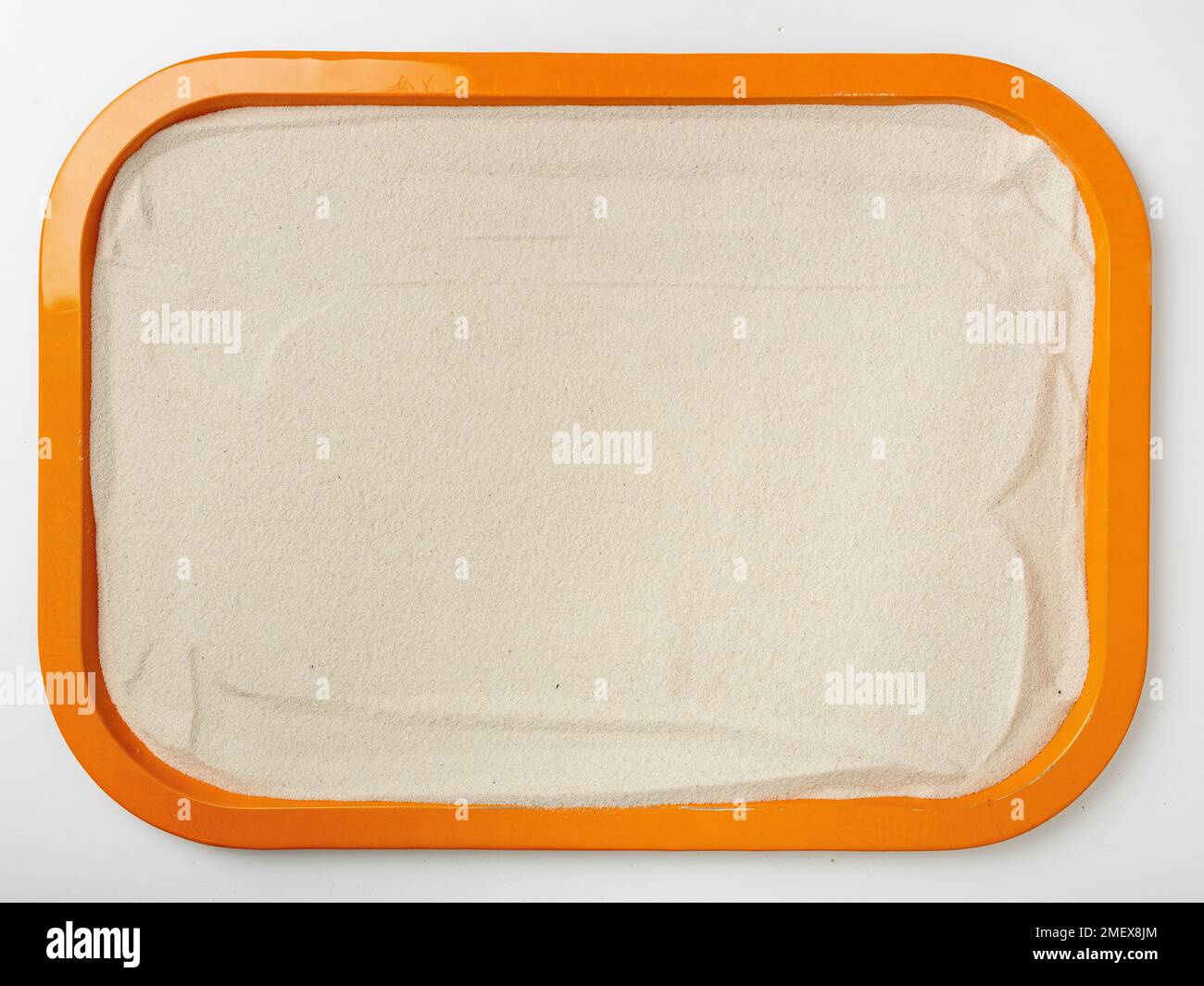 Tray with sand on Stock Photo - Alamy