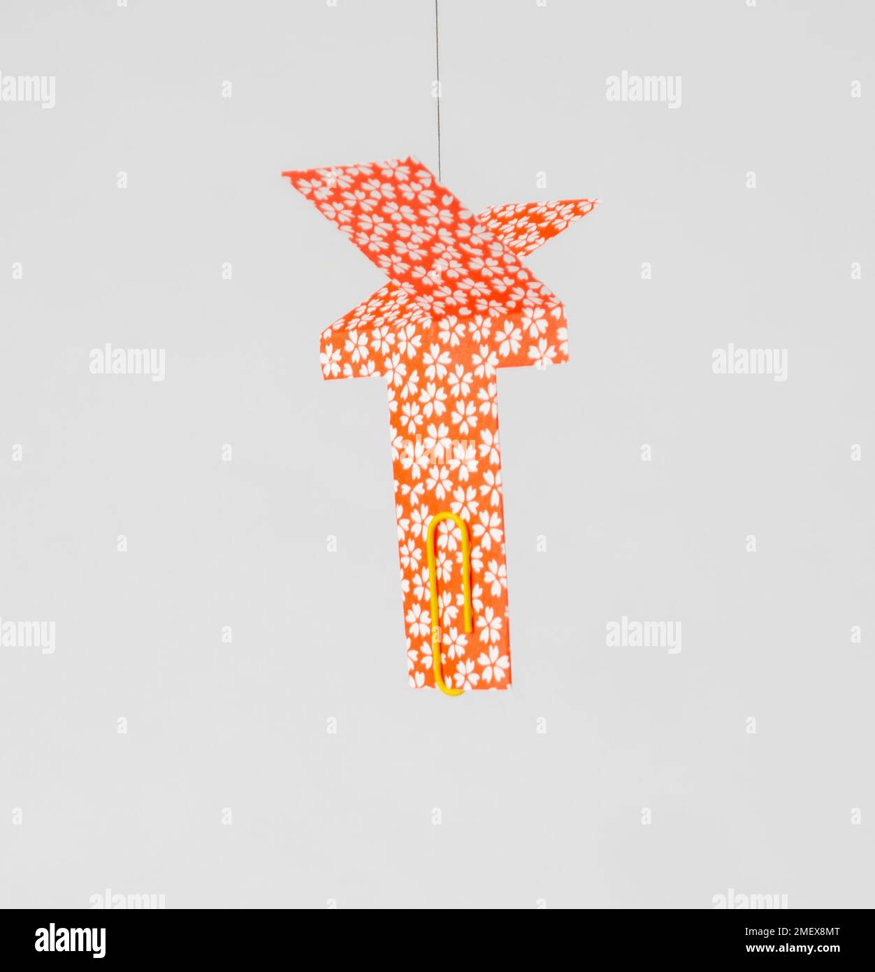 Paper helicopter paper clips hi-res stock photography and images - Alamy