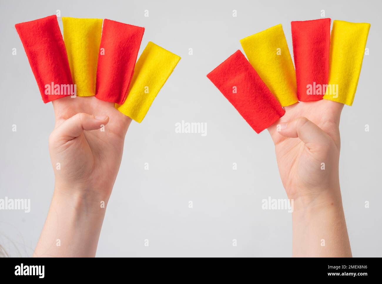 Felt finger puppets on hands Stock Photo - Alamy