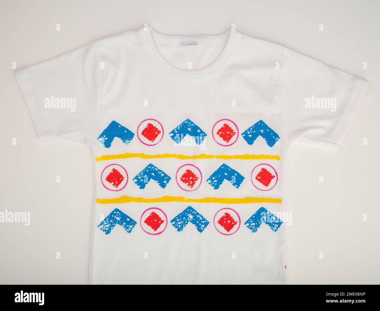 Patterns in a line on white Tshirt Stock Photo - Alamy