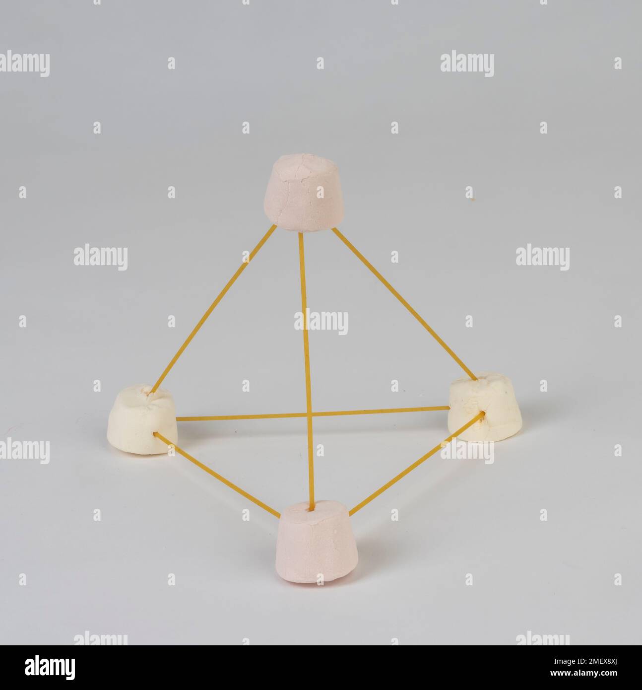 Marshmallow and spaghetti prism Stock Photo - Alamy