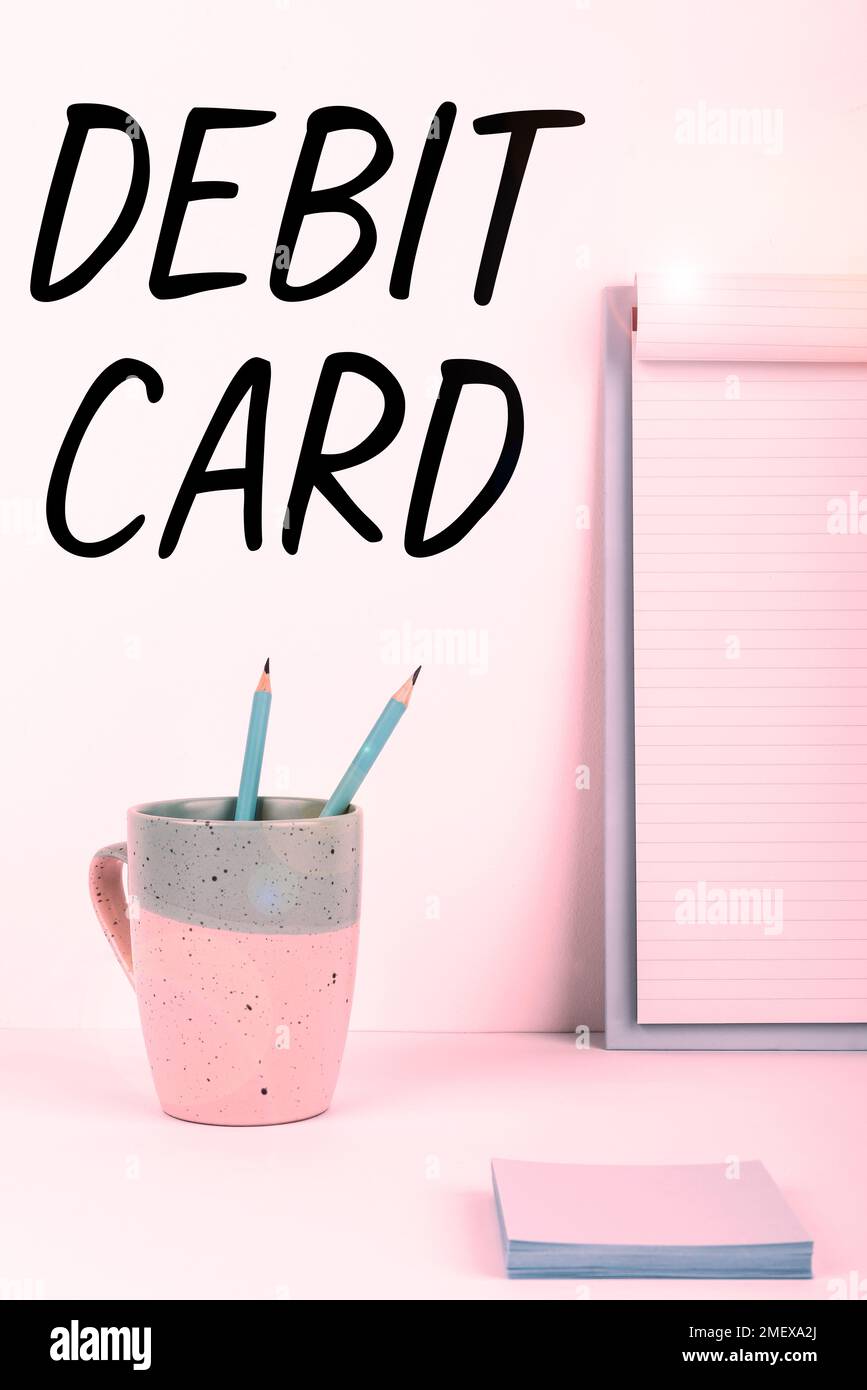 Hand writing sign Debit Card. Business approach card that deducts money ...