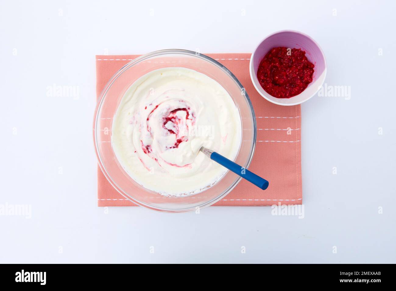 Raspberry ripple layer cake - Step 1 - small bowl of crushed ...