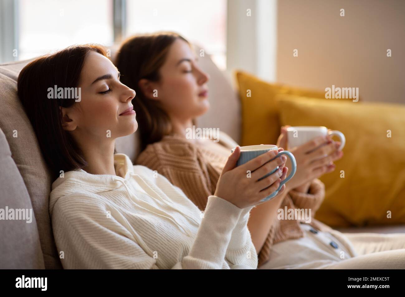 Sit and relax eyes closed woman hi-res stock photography and images - Alamy