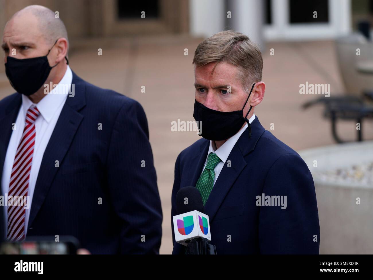 Boulder County, Colo., District Attorney Michael Dougherty, right, and ...