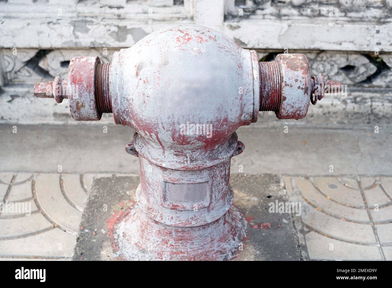 A vintage water connection point on the foot walk beside the road Stock ...