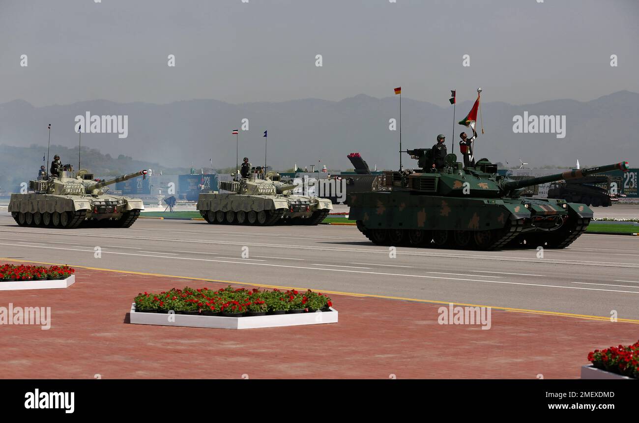 Pakistani-made tanks are on display during a military parade ...