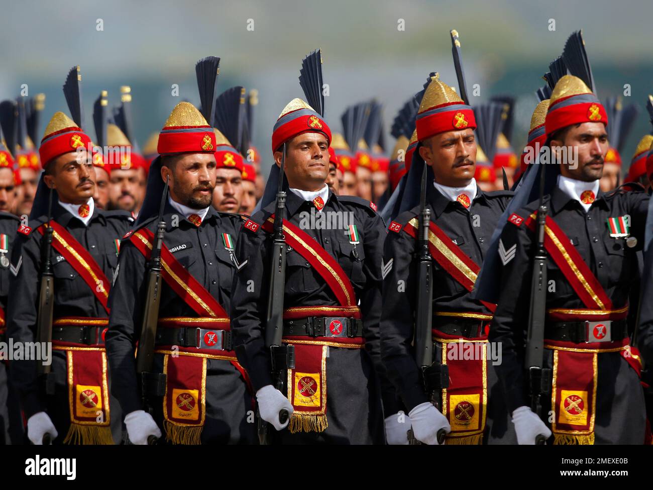 Pakistani troops march during a military parade marking Pakistan ...