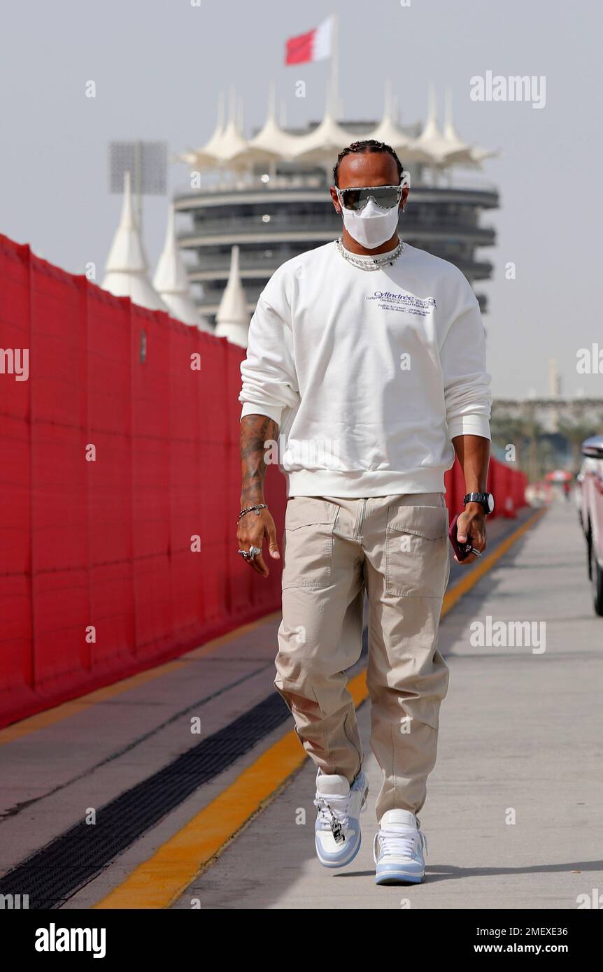 Mercedes driver Lewis Hamilton of Britain arrives to the Bahrain ...