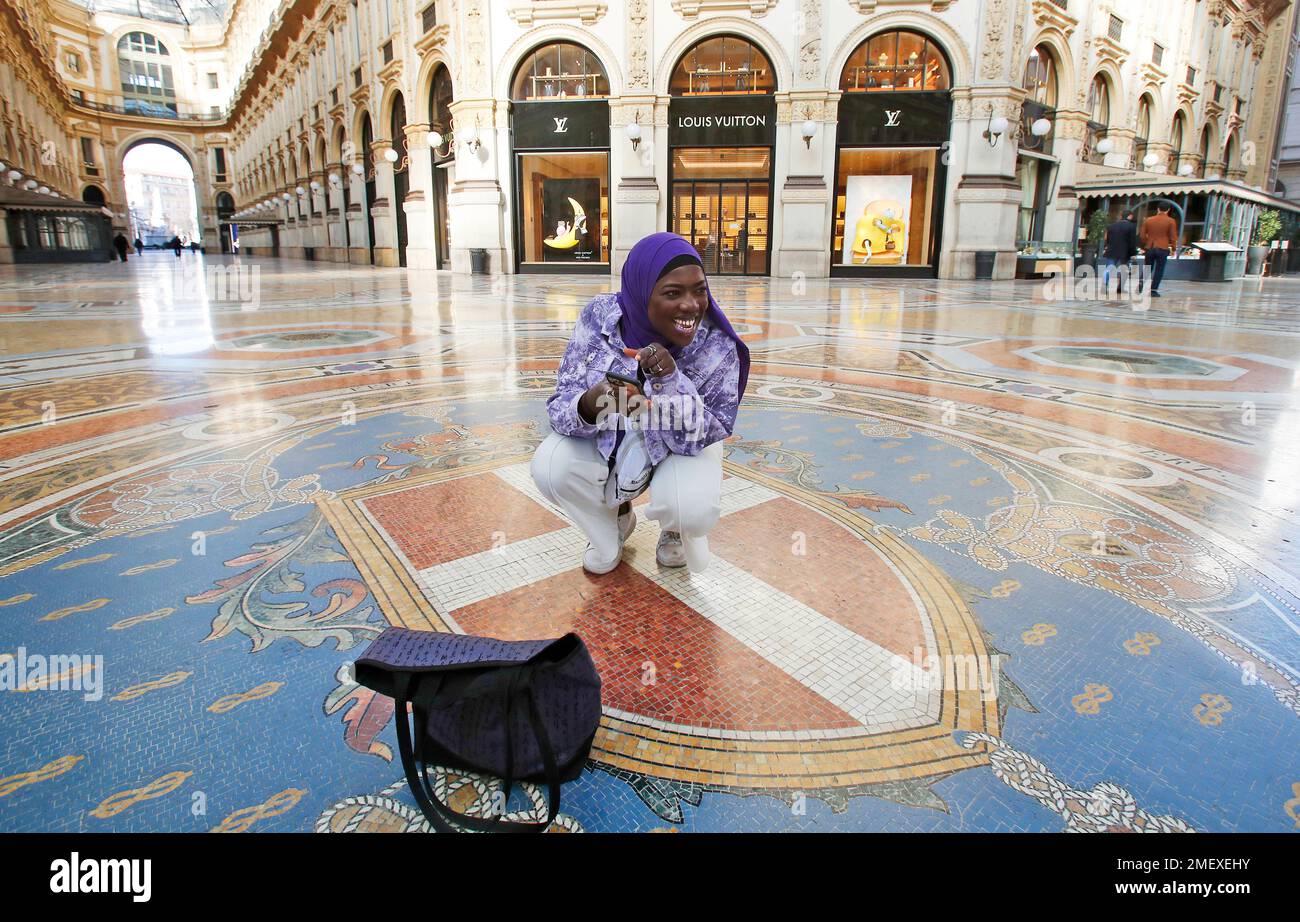 Influencer Aida Diouf Mbengue smiles in an empty Vittorio Emanuele II ...