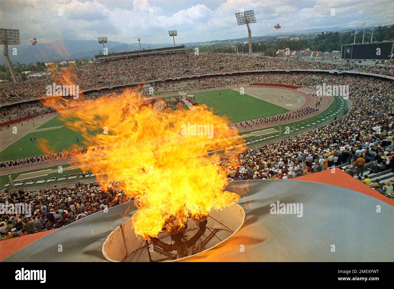 The Olympic Torch burns during the opening day ceremony in Mexico City ...
