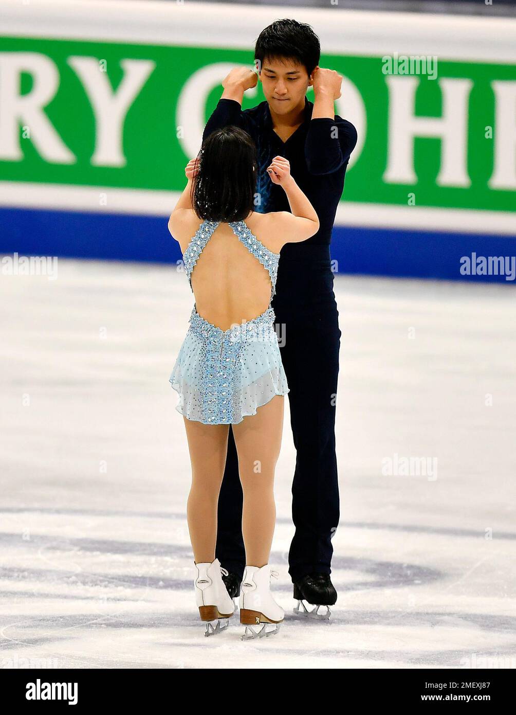 Riku Miura and Ryuichi Kihara of Japan react after performing during ...