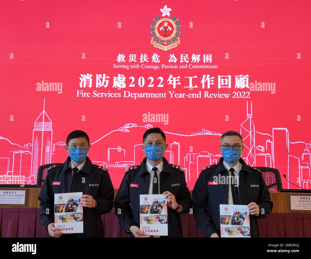 Director of Fire Services Andy Yeung Yan-kin (centre), flanked by ambulance services deputy ...