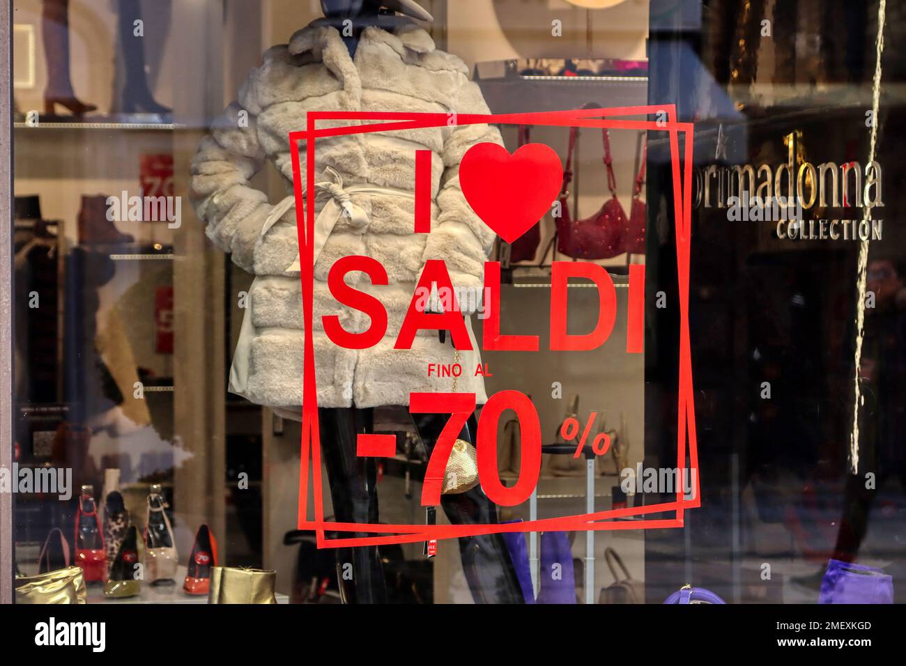 Window of a clothing store with the words I Love Sale Stock Photo - Alamy