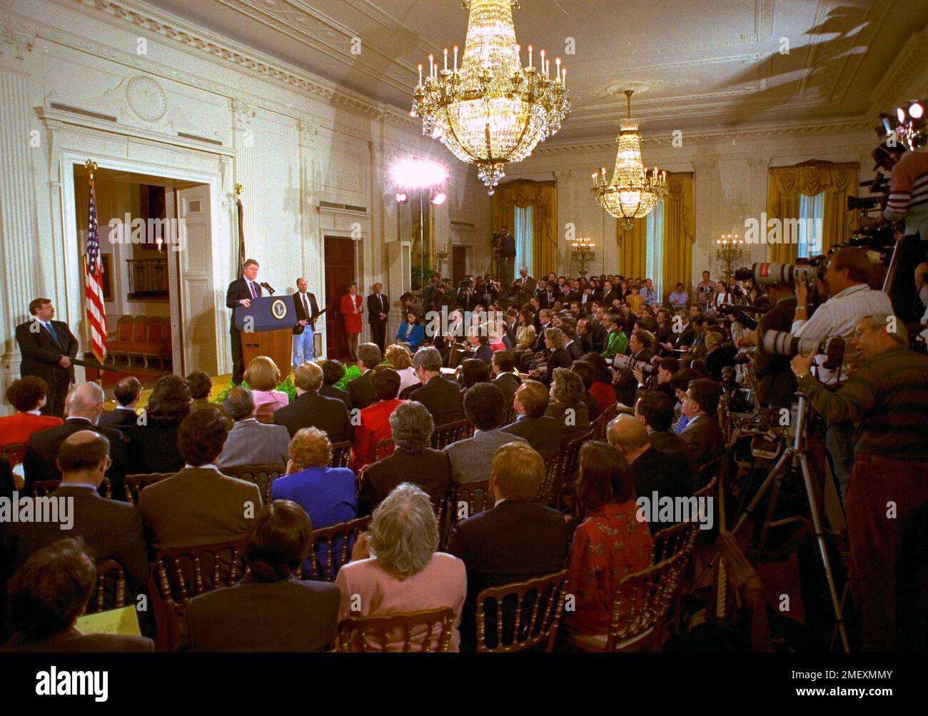 FILE - In this March 23, 1993, file photo, members of the media fill ...