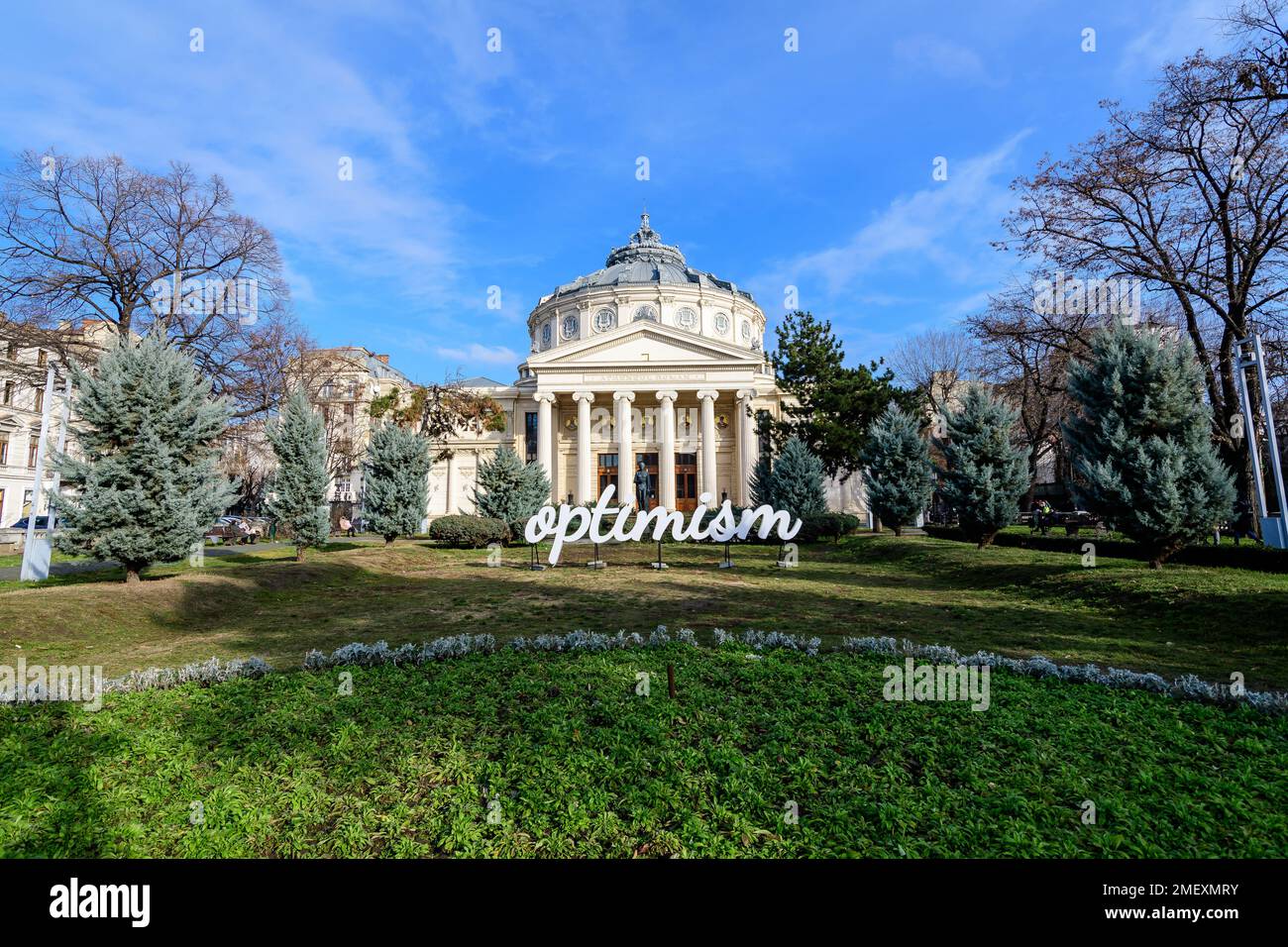 Bucharest, Romania, 2 January 2022: Optimism word displayed in front of ...