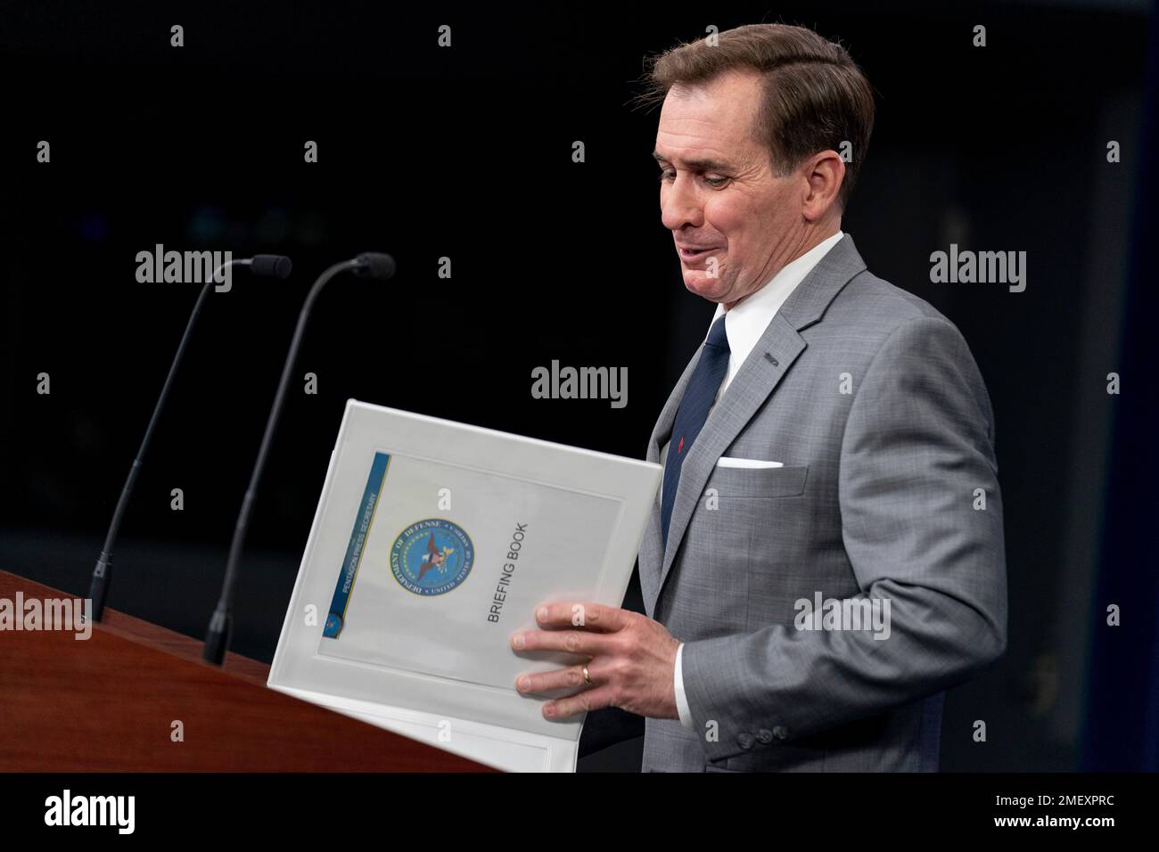 Pentagon spokesman John Kirby arrives for a media briefing at the ...