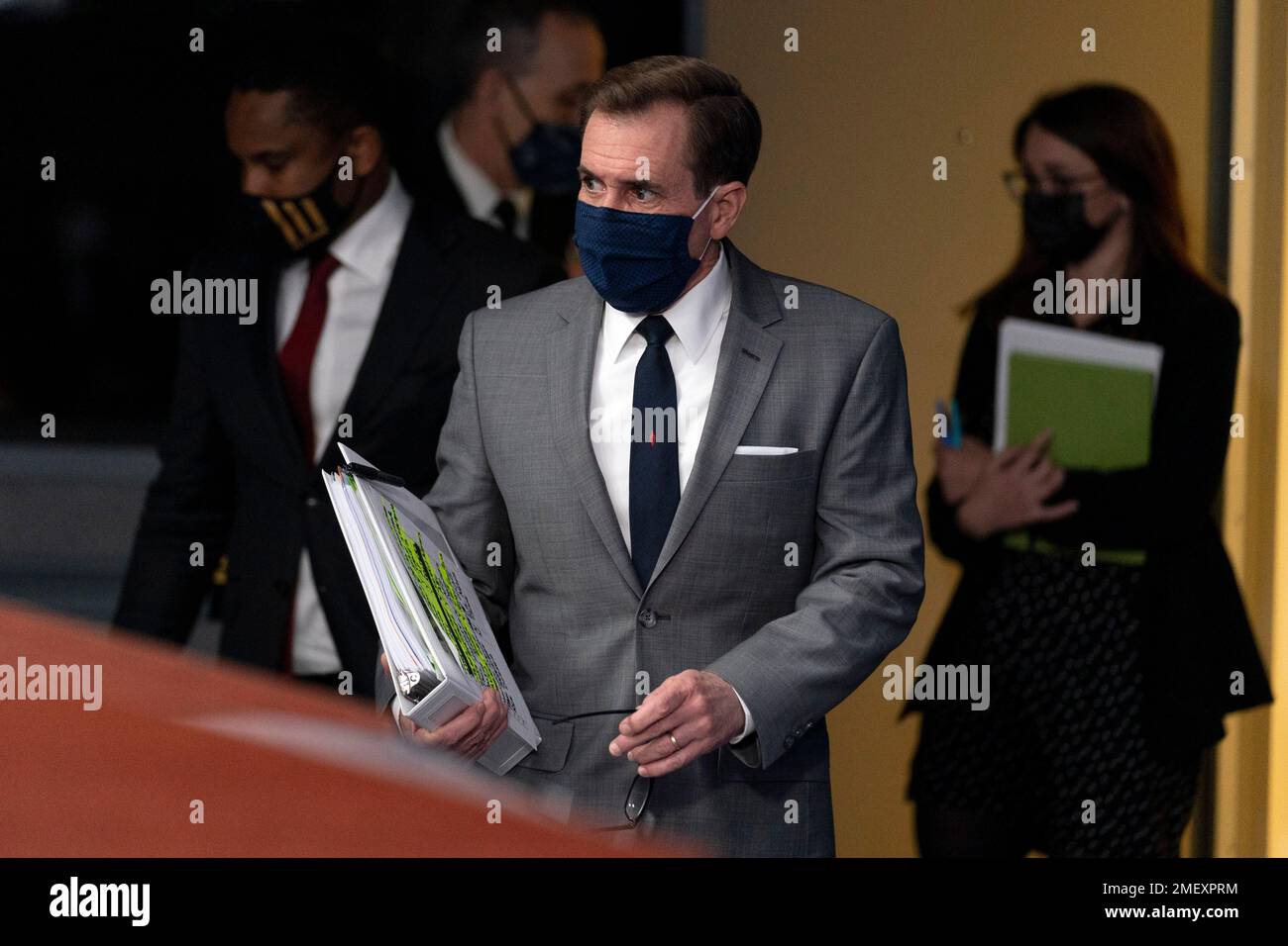 Pentagon spokesman John Kirby arrives for a media briefing at the ...