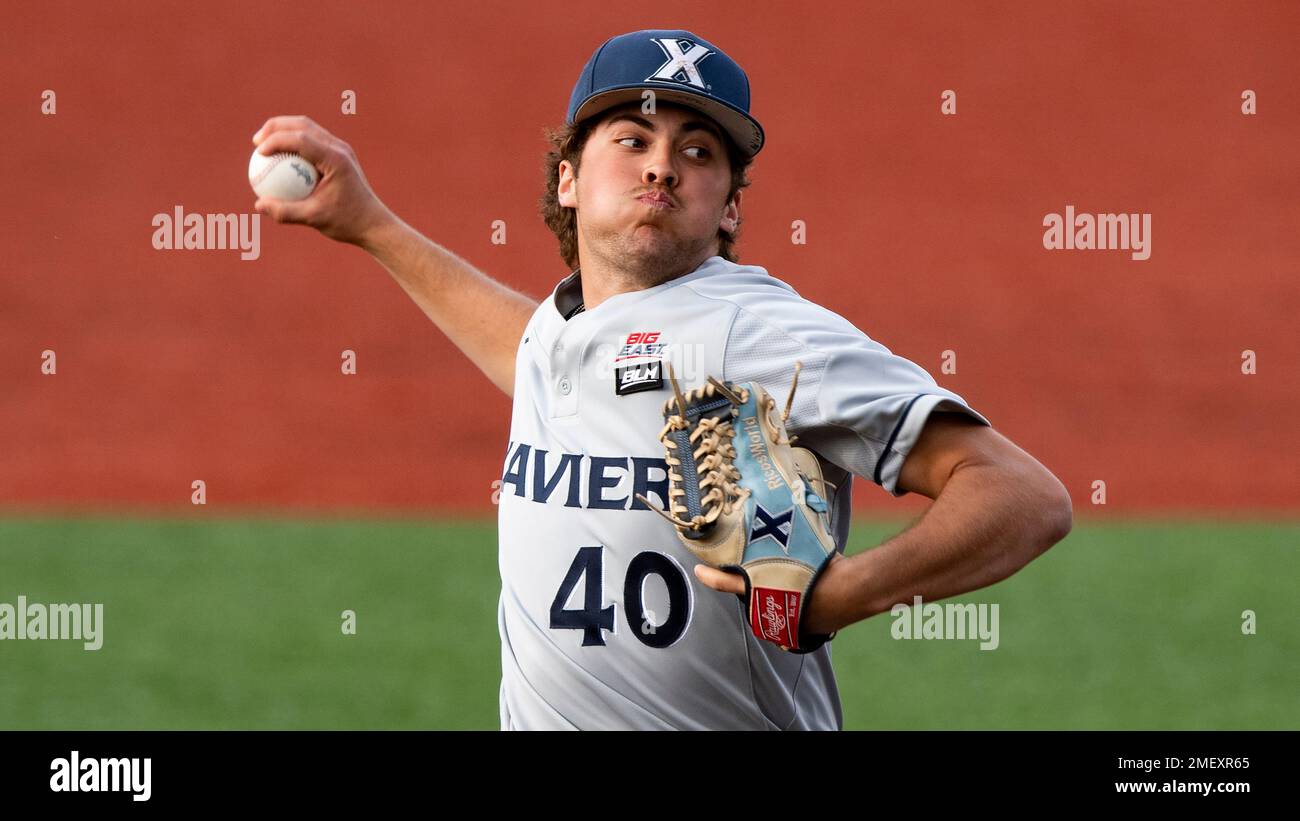 Michael Dillon (40) of Xavier delivers a pitch during an NCAA baseball ...