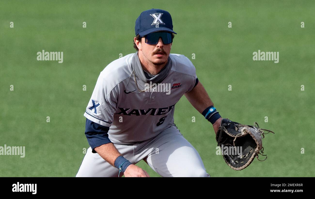 Jonathan Kelly (8) of Xavier during an NCAA baseball game against ...