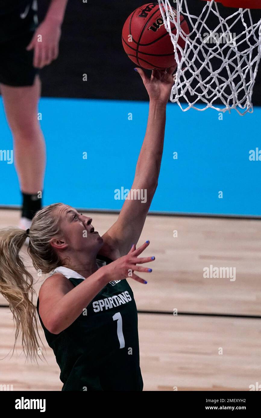 Michigan State guard Tory Ozment puts up a shot during the first half ...