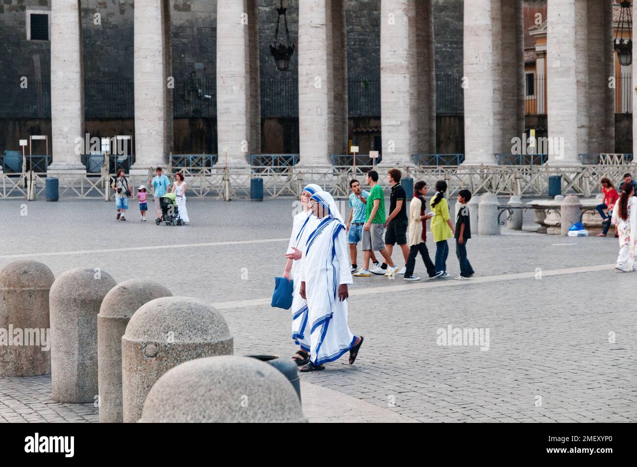 Two nuns walking across St Peter’s Square, Vatican City, Rome, Italy ...