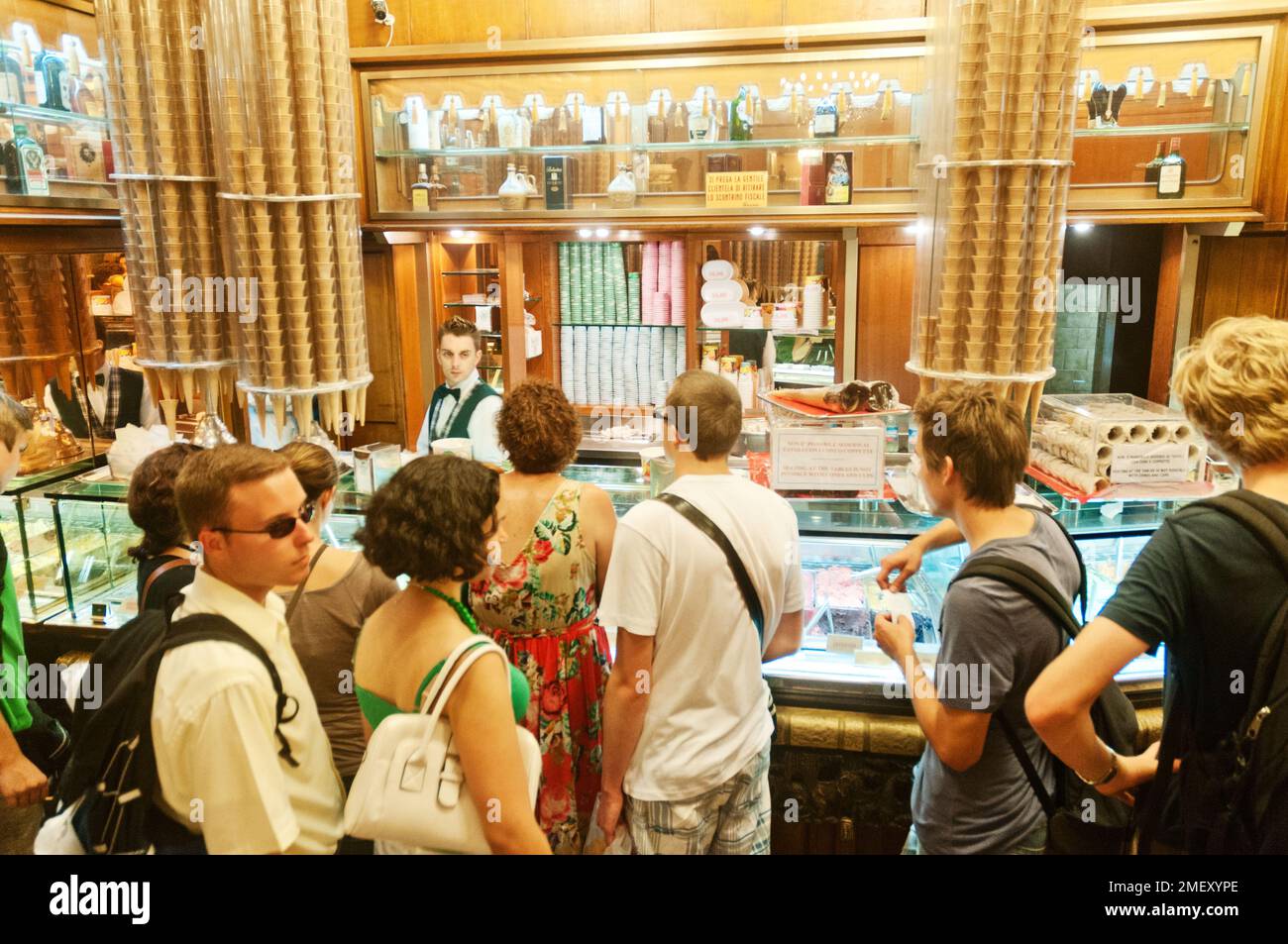 Tourists ordering ice cream in a gelato shop in Rome, Italy Stock Photo ...
