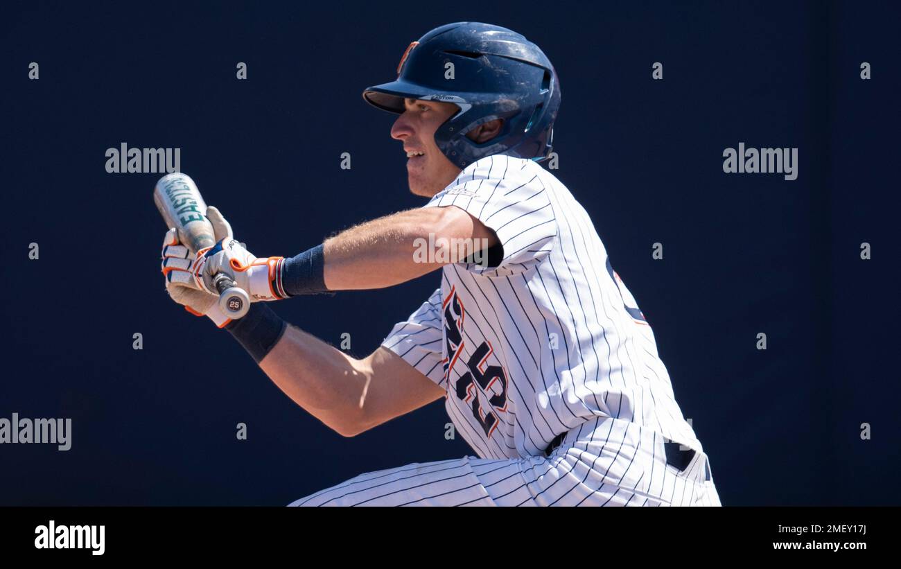 Cal State Fullerton's Cole Urman squares a bunt during an NCAA baseball ...