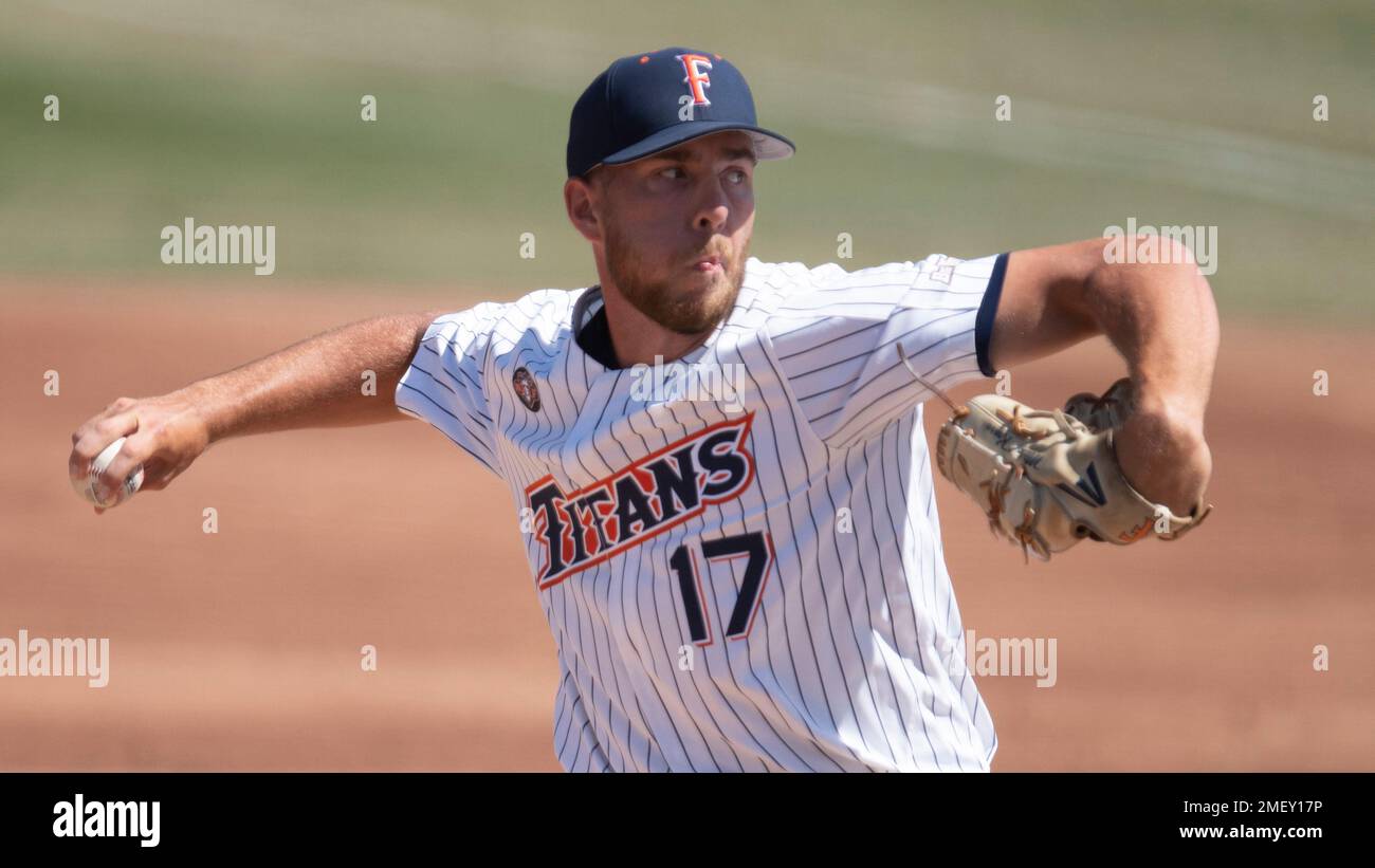 Cal State Fullerton starting pitcher Michael Knorr delivers a pitch ...