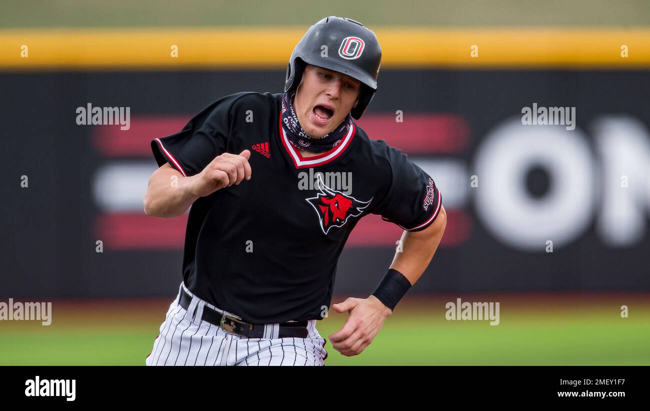 Omaha catcher Brett Bonar (1) runs home in the eighth inning against ...